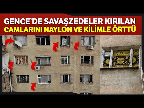 Gence’de Füze Saldırısı Sonucu Camları Kırılan Savaşzedeler Kırılan Camlarını Naylonla Örttü