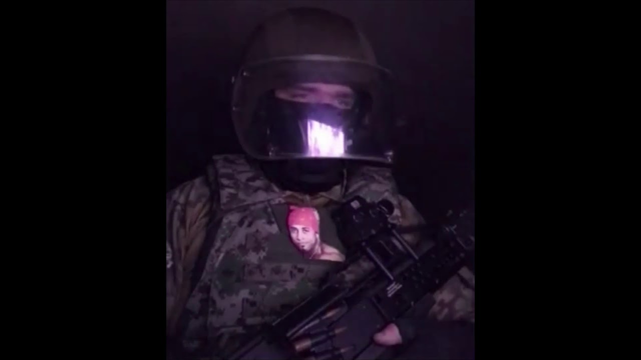 Man in russian military uniform listening to russian doomer music - YouTube