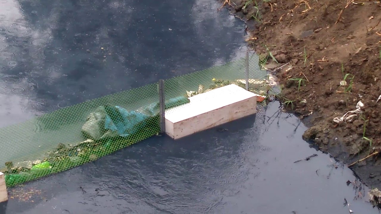 floating aqua boom barrier - YouTube