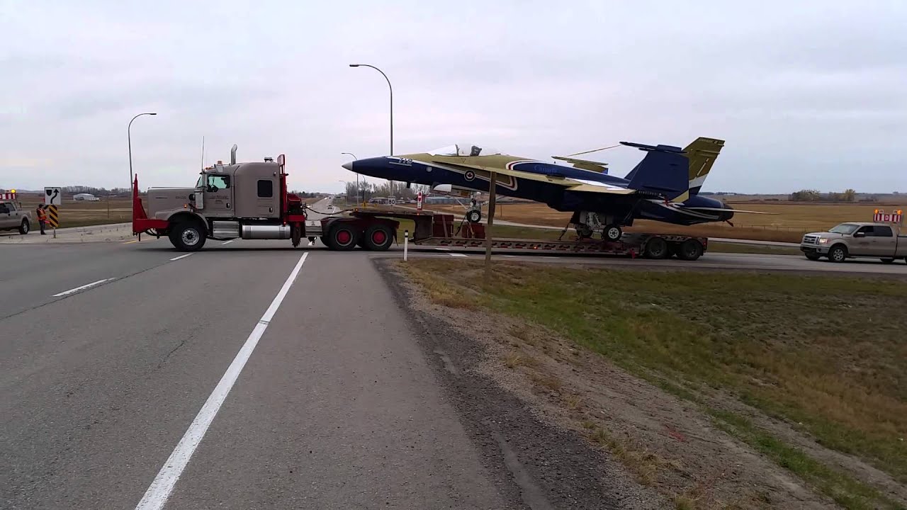F18 transported by Rangeland Truck & Crane - YouTube