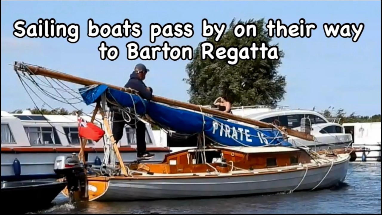 Sailing boats pass by on their way to Barton Regatta - YouTube