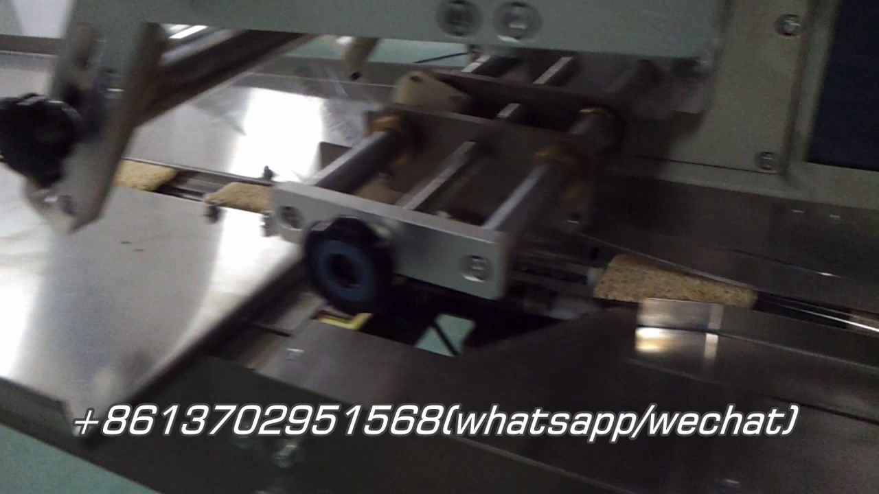 Peanut Candy Bar Flow Wrapper, flowpack machine - YouTube