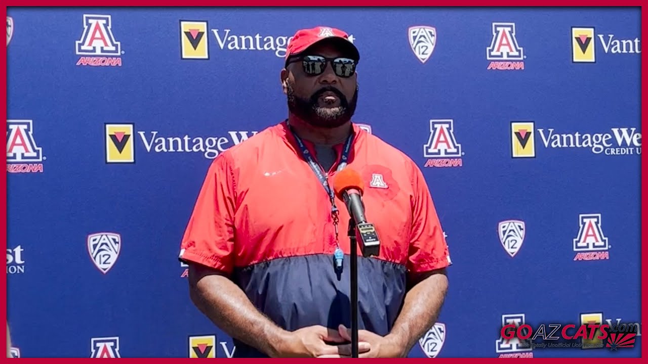 Defensive line coach Ricky Hunley after Arizona's camp practice No. 5 ...