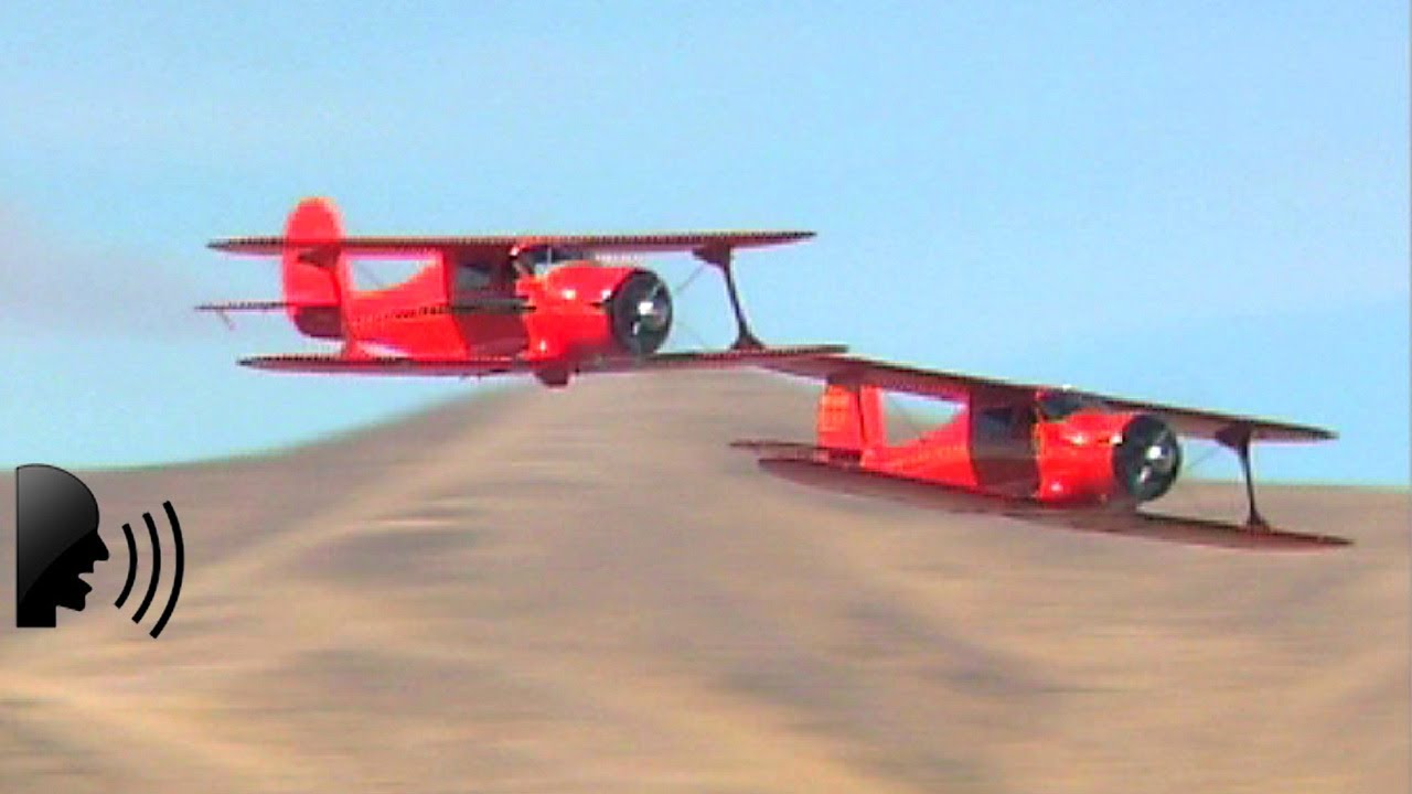Two bright red Beech Model 17 'Staggerwings' - YouTube