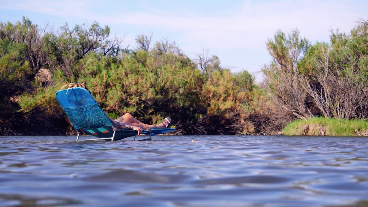 Lawn chair in the river Cinegraph 4k - YouTube