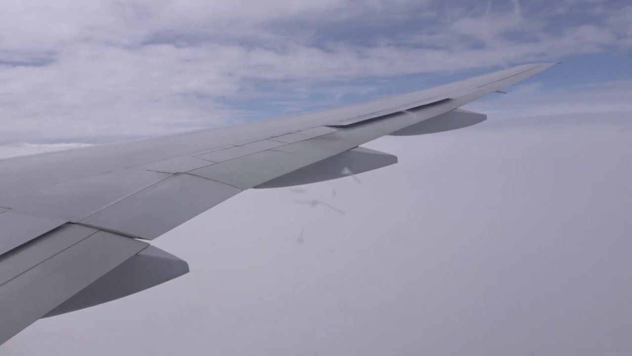 Flying Over Canada - Coming in to Land Over Very Cloudy Toronto - YouTube