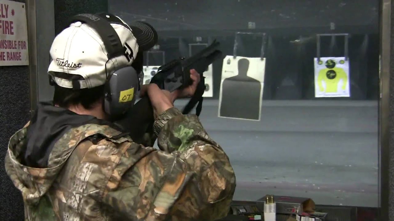 Peyton Shooting a FNH SLP Mark-I Tactical Shotgun - YouTube