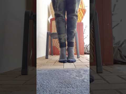 Boy feet in striped socks