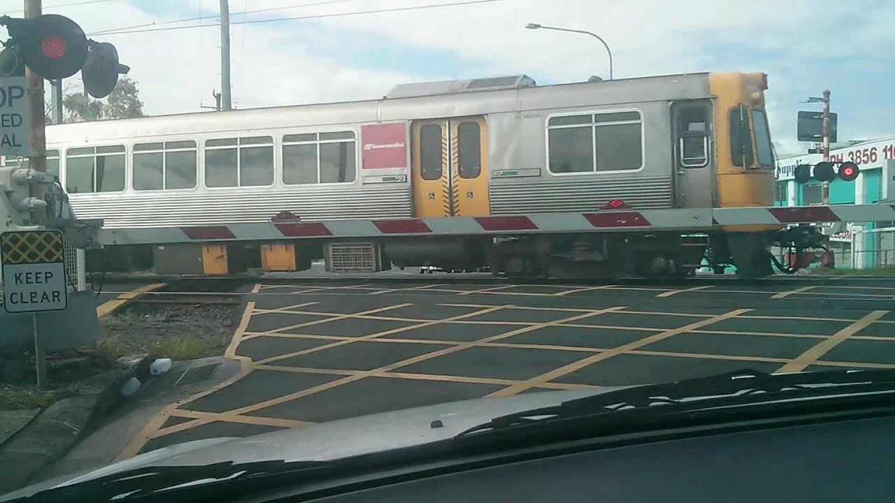 QR EMU level crossing - YouTube