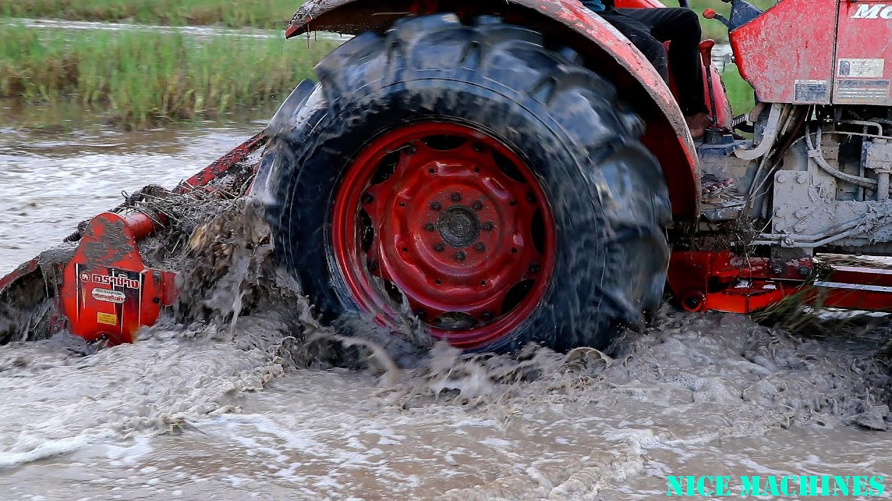 Tractor Puddling Rotavator Swimming In Muddy Water Work Fields ...