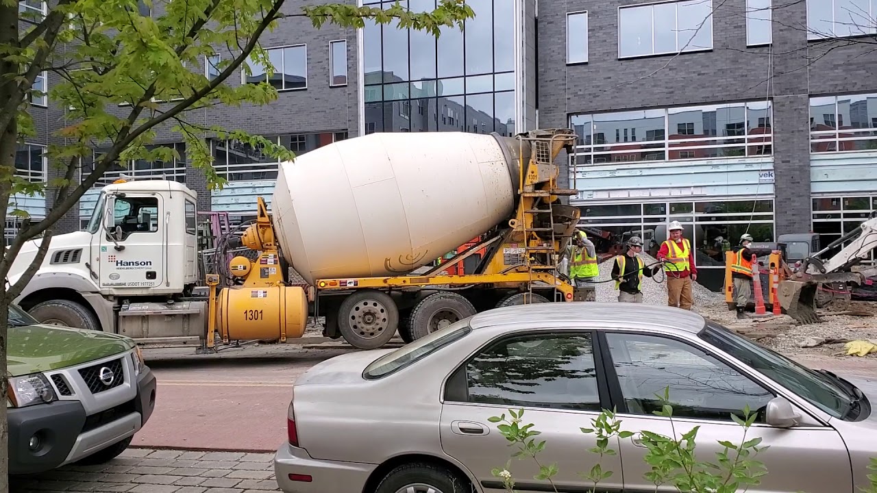 Cement mixer truck and a small digger - YouTube