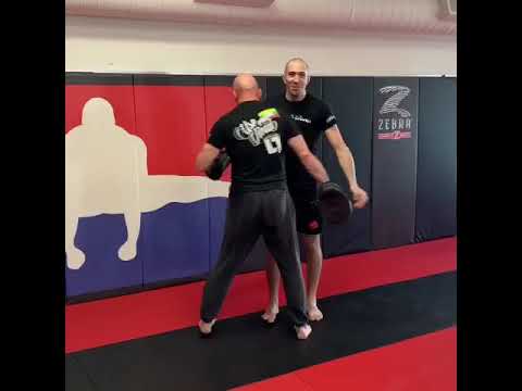Dave Leduc & Bas Rutten pad splitting - YouTube