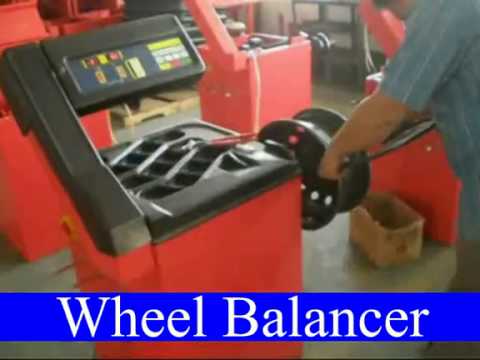 SCAPE tire changer and wheel balancer operation - YouTube