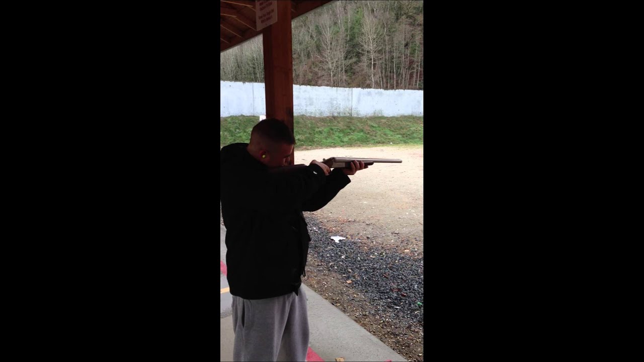 Shooting double barrel shotgun double trigger at once - YouTube