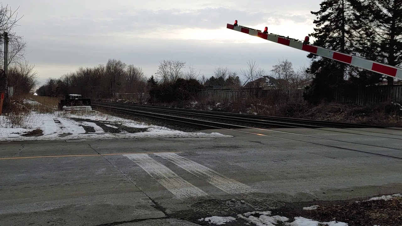 ASMR GO Train Passes Crossing - YouTube