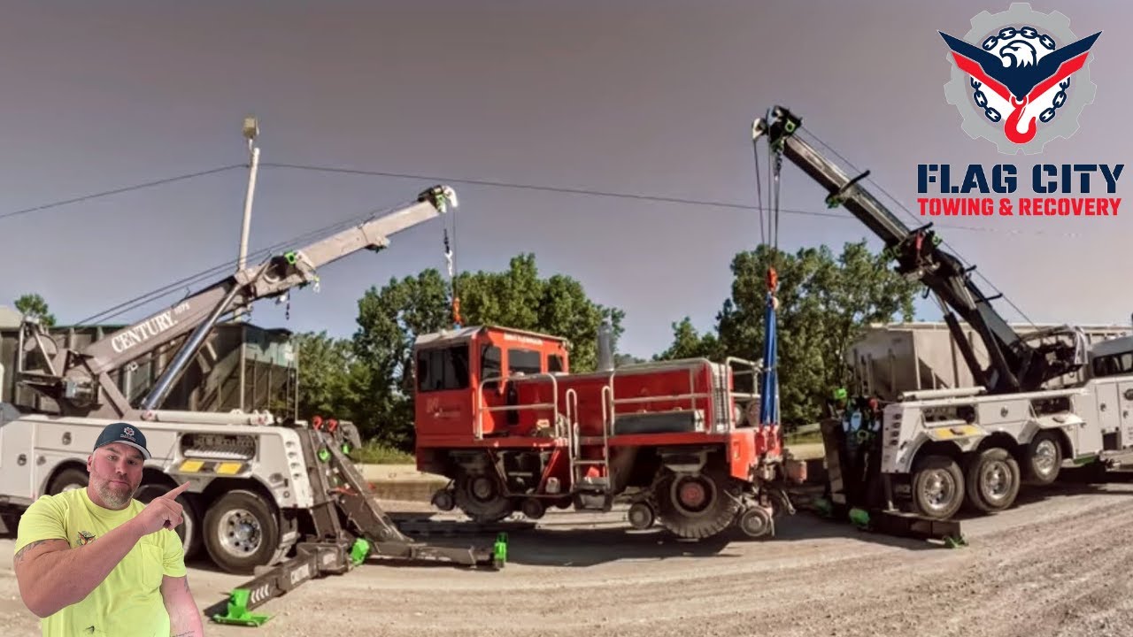 Thats Expensive!! Twin Rotator lift loading a rail machine - YouTube