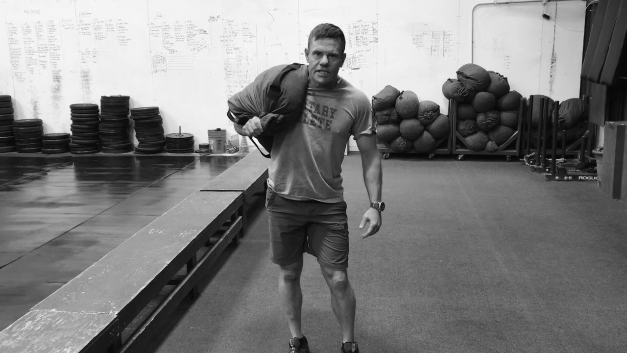 Sandbag Getup Exercise - YouTube