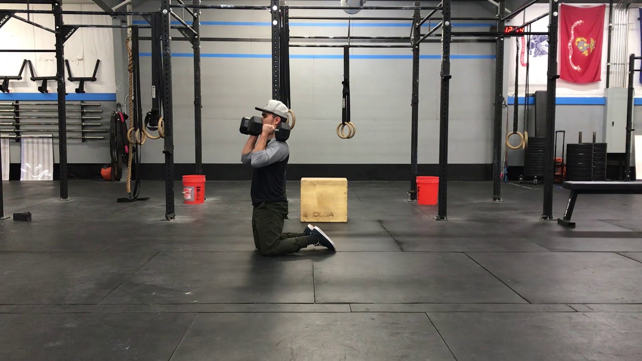 Kneeling dumbbell push press - YouTube