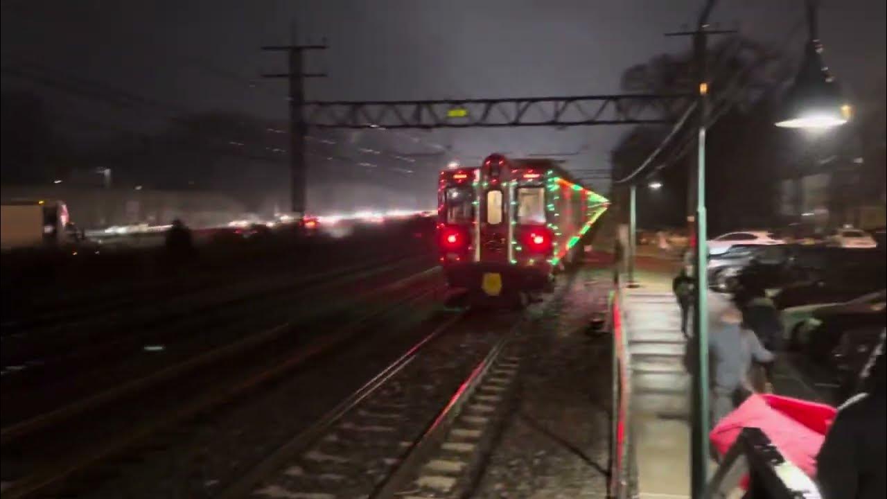 Metro north Christmas lights train at Larchmont New York - YouTube