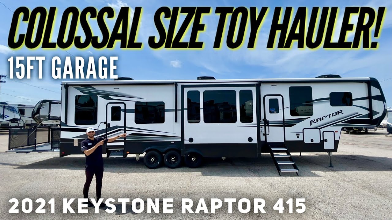 COLOSSAL Raptor RV with 15ft Garage! | 2021 Keystone Raptor 415 - YouTube