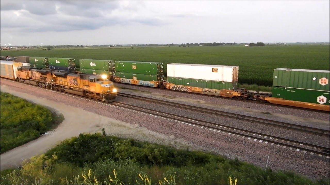 UP 7791 east meets UP 8496 west and 2 SD40N's build a train at G3 in Rochelle IL - YouTube