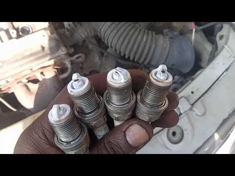 first time spark plugs white carbon - YouTube