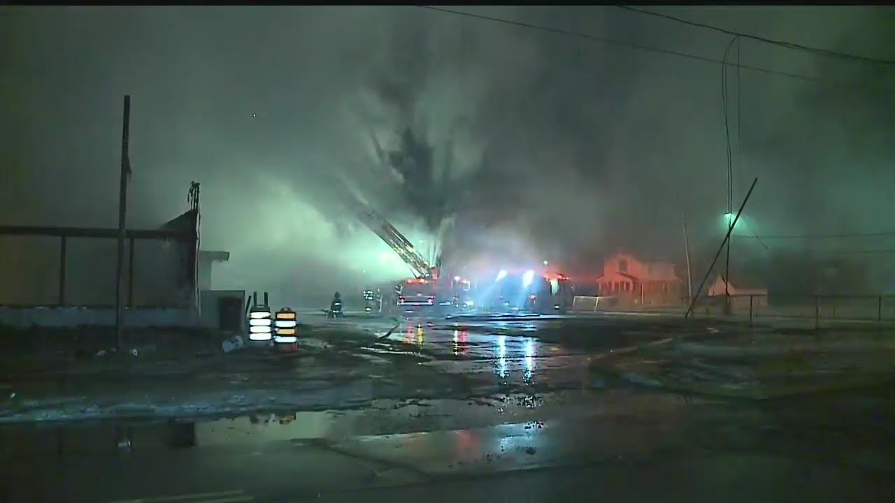 Crews on scene of fully involved fire at local bar - YouTube