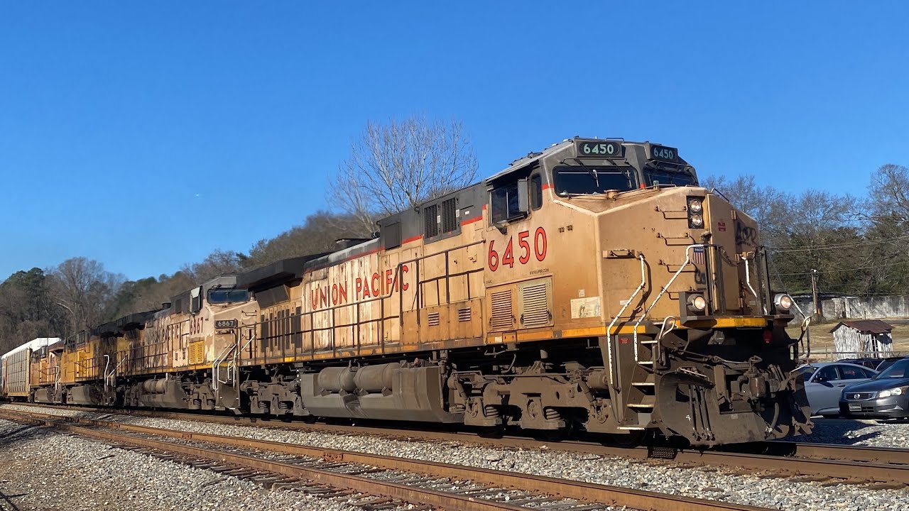UP 6450 leads a short NS 28R in Belmont with a quartet of Union Pacific ...
