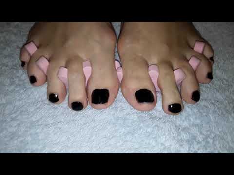 Sexy feet with black nail polish