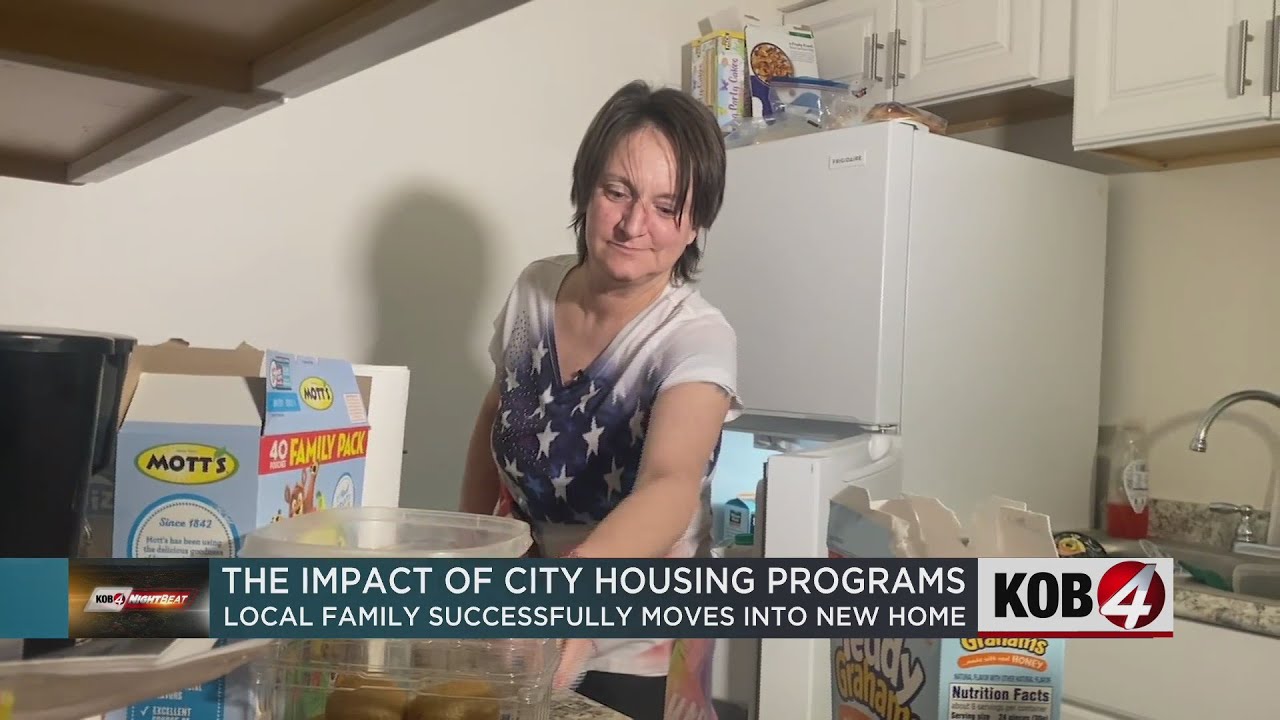 Family moves into new home thanks to city housing program - YouTube