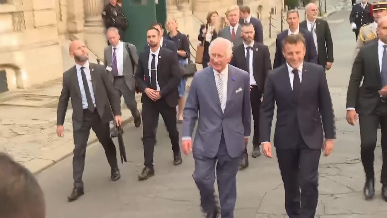 King Charles and Macron on walkabout in Paris - YouTube