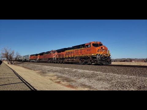 BNSF 8027 leads a southbound Z-Train through The Station @ Central Park ...