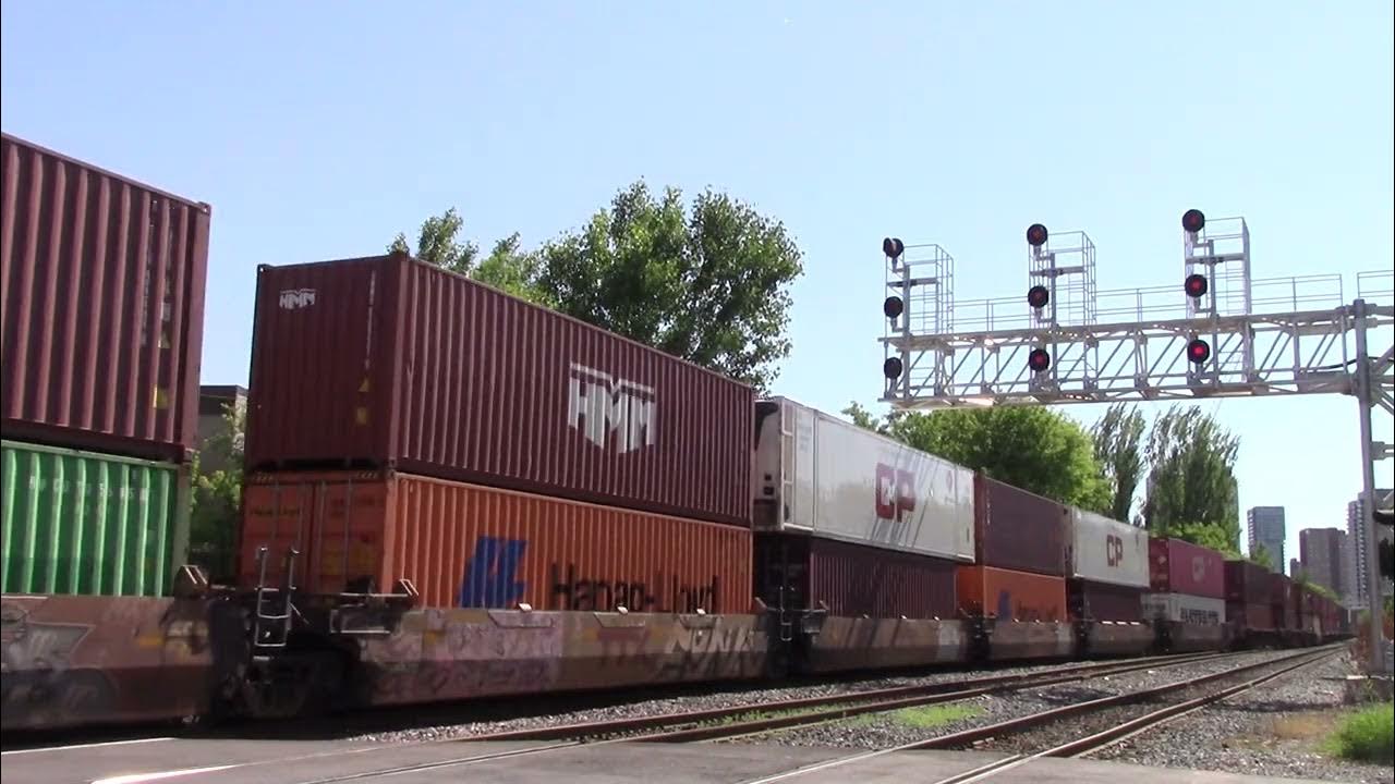 (CPKC) CP 113 with KCS 4143 passing Osler - YouTube