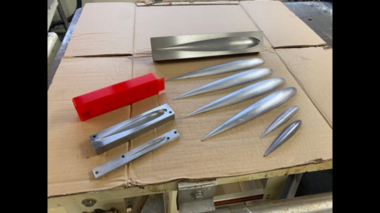 Casting a lead RC sailboat ballast bulb in CNC aluminum molds - YouTube