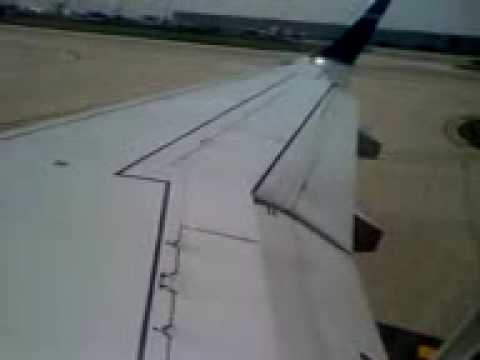 Us Airways Plane Landing Over Wing View - YouTube