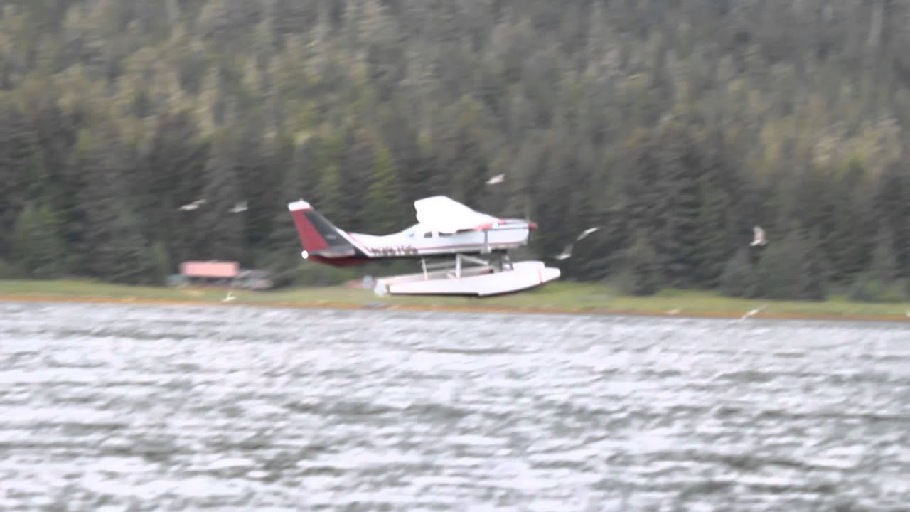 Floatplane taking off from the water in Alaska - YouTube