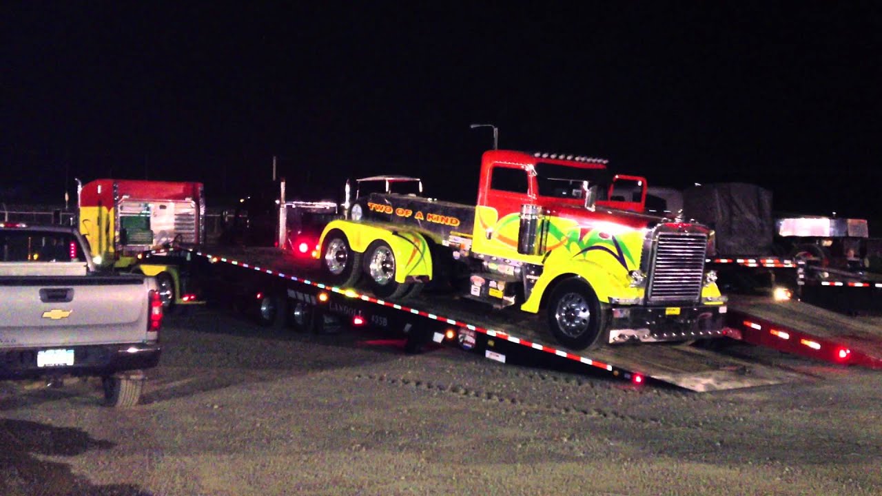 Big Rig Pulling Series "Two of a Kind" winched onto trailer - YouTube