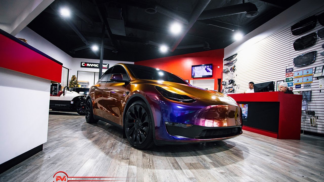 Tesla Model Y with Gloss Roaring Thunder Vinyl Wrap & Ceramic Pro PPF ...