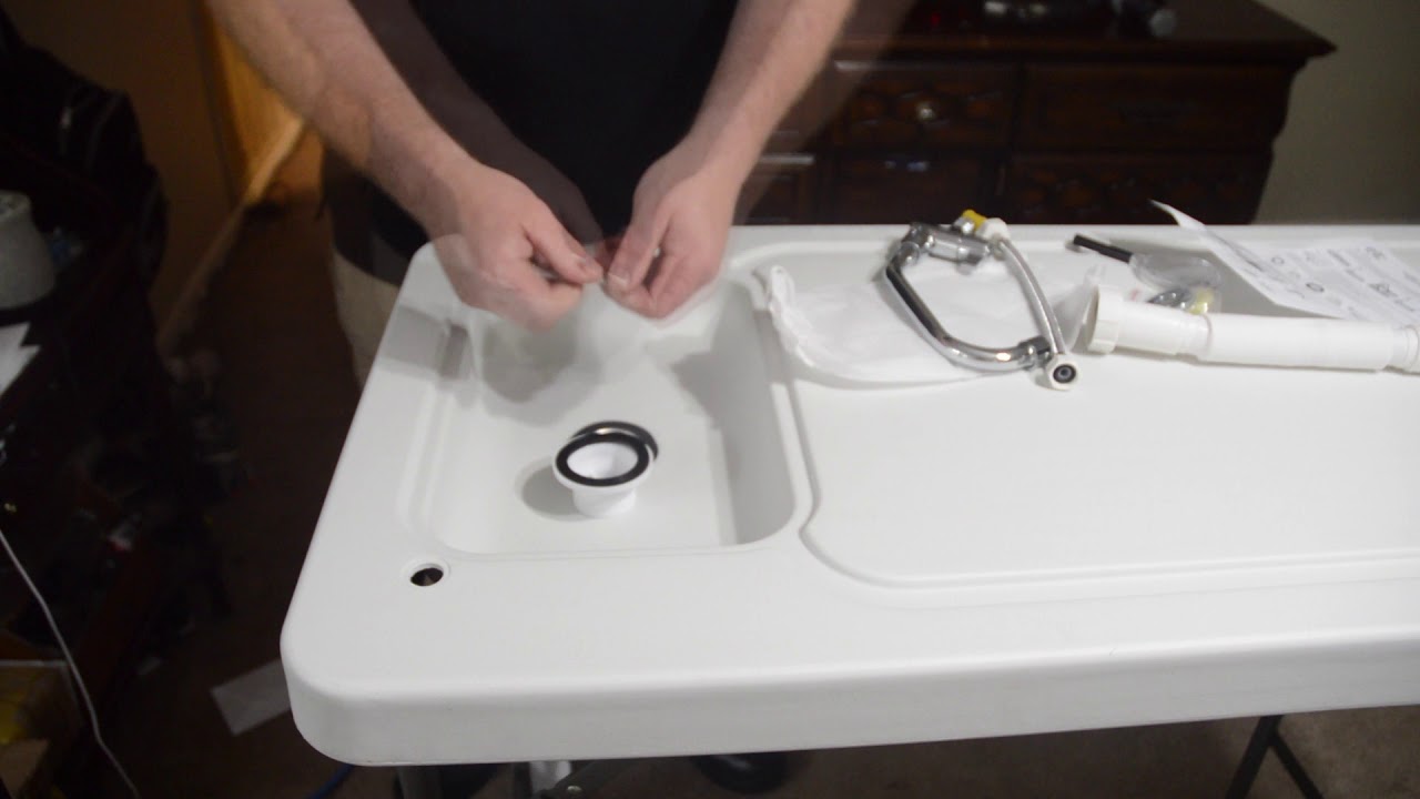 Installing Drain on a Portable Fish Processing Table - YouTube