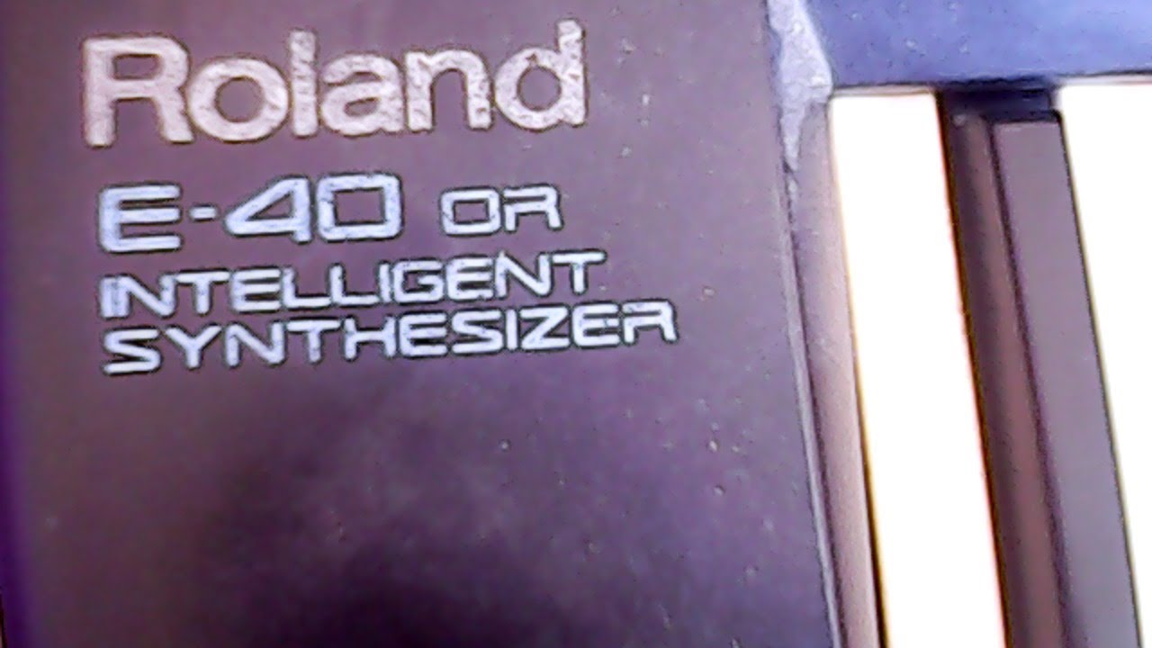 العزف على آلة Roland E-40 - YouTube
