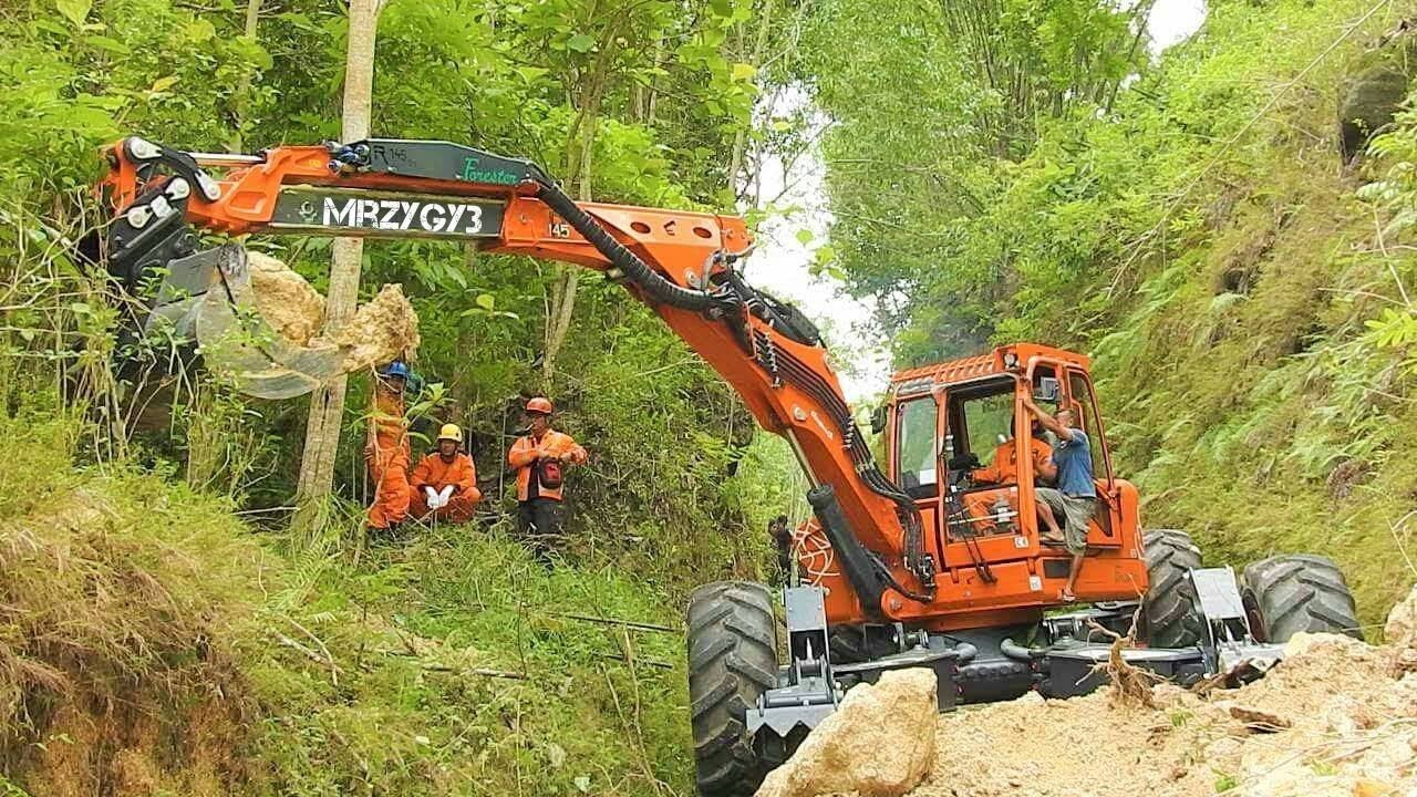 Spider Excavator Clearing Landslide Euromach R145 - YouTube