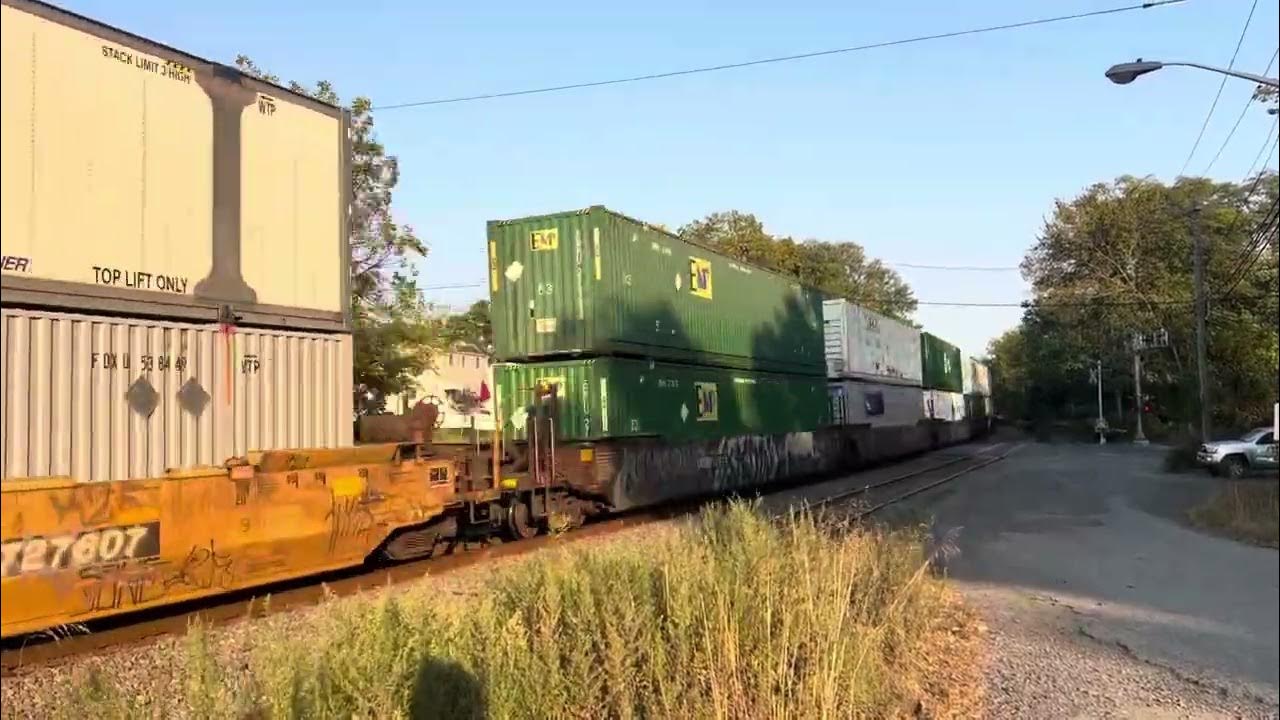 NS 7567 ES44DC leads NS 23G through Piscataway,NJ with a friendly crew & a Nice 2PC K5HL horn ...