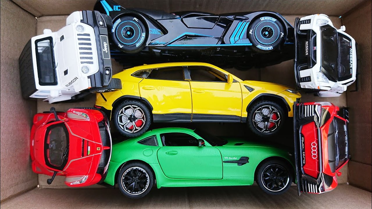 Model cars in the box, Lafarrari, Jeep, Mercedes, Audi, Lamborghini ...
