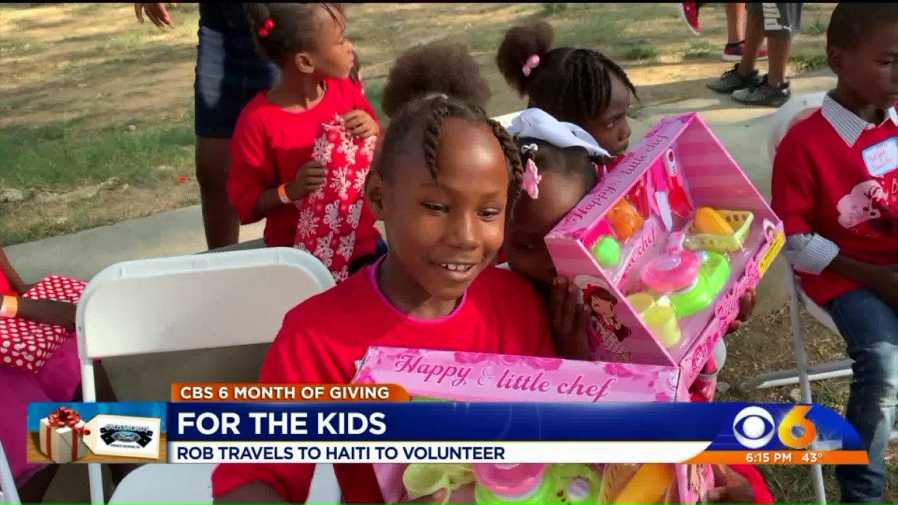 Rob Desir helps bring smiles to Haitian children in need - YouTube
