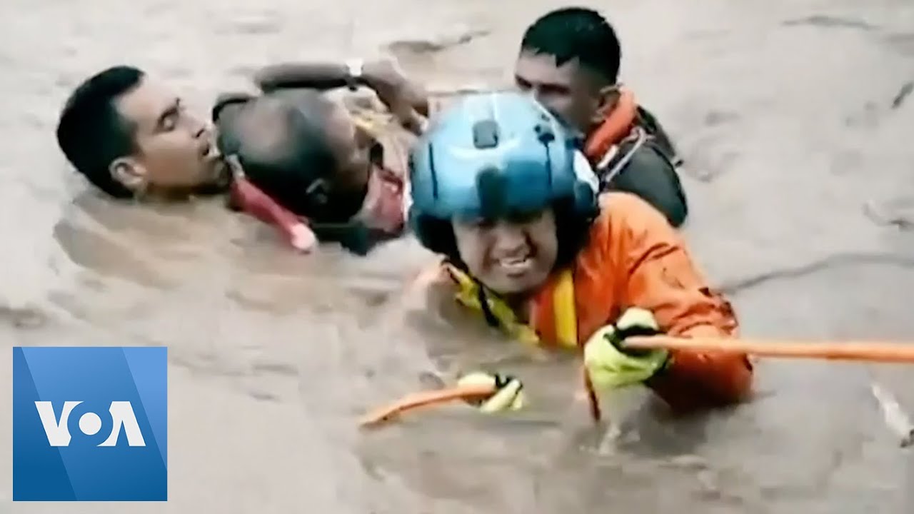 Stranded People Rescued From Tropical Storm Narda Floodwaters in Mexico ...