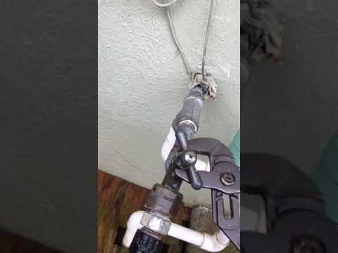 Adjusting a packing on a hose bib - YouTube