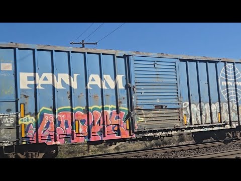 BNSF 7743 west, international intermodal and BNSF 3756 west Hauler exiting Mormon Rocks 11/21/24 ...
