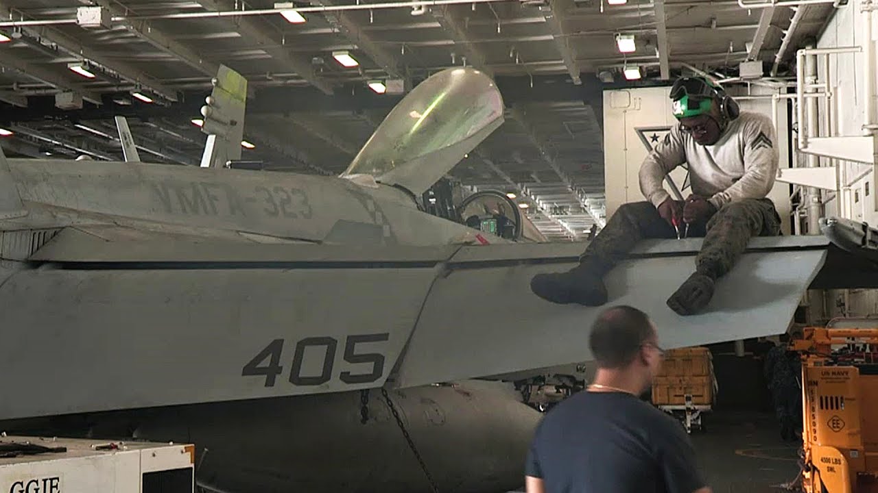F/A-18 Hornet Maintenance Aboard Aircraft Carrier USS Nimitz - YouTube