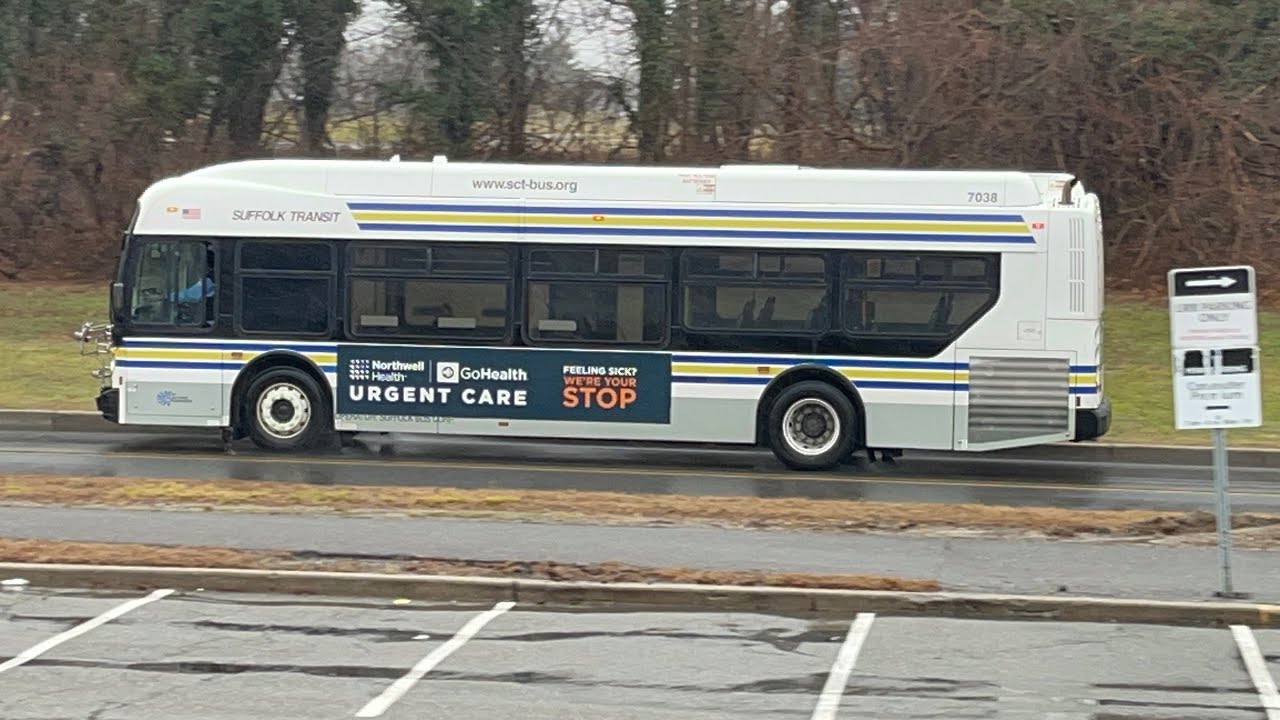 Suffolk County 2019 New Flyer XDE35 7038 S51 passing by in the rain ...