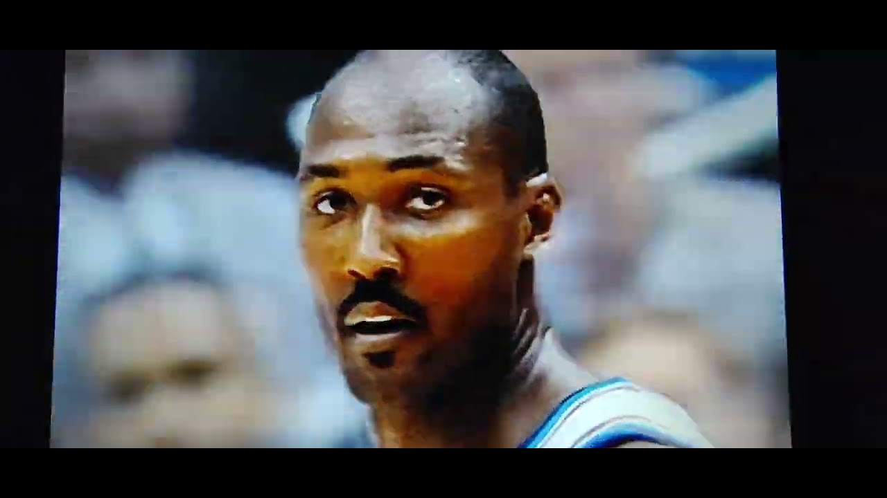 Chicago Bulls F/C Brian Williams forearm checks Karl Malone in the 1997 ...
